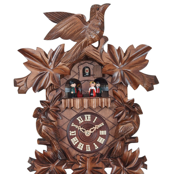 Carved battery-powered cuckoo clock with large cuckoo bird, two smalle ...