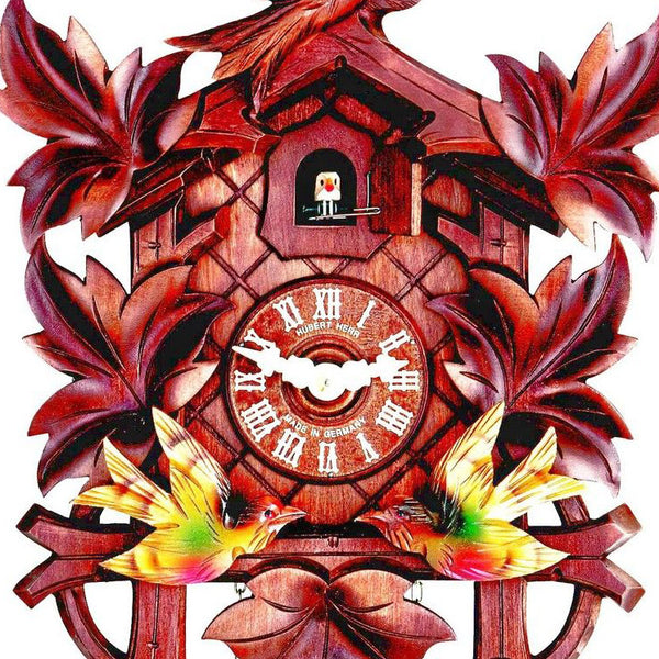 Carved 8-day cuckoo clock with large cuckoo bird, two moving birds and ...