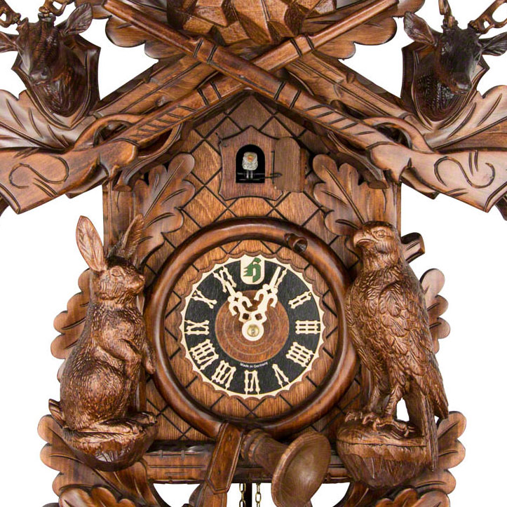 Carved 8-day hunting style cuckoo clock with large stag, mounted stag ...