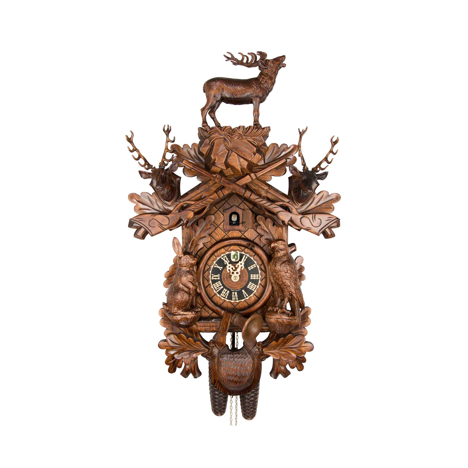 Carved 8-day hunting style cuckoo clock with large stag, mounted stag ...