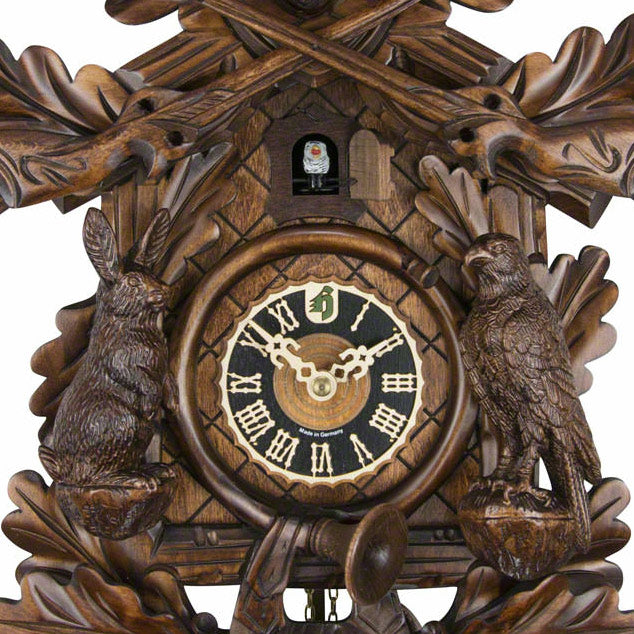 Carved 8-day hunting style cuckoo clock with large stag, rifles, fürst ...