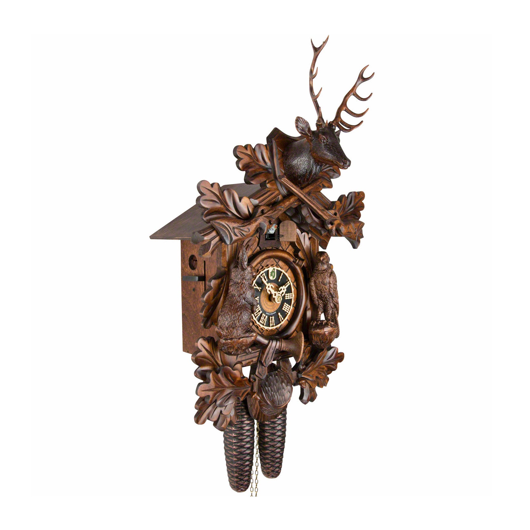 Carved 8-day hunting style cuckoo clock with large stag, rifles, fürst ...