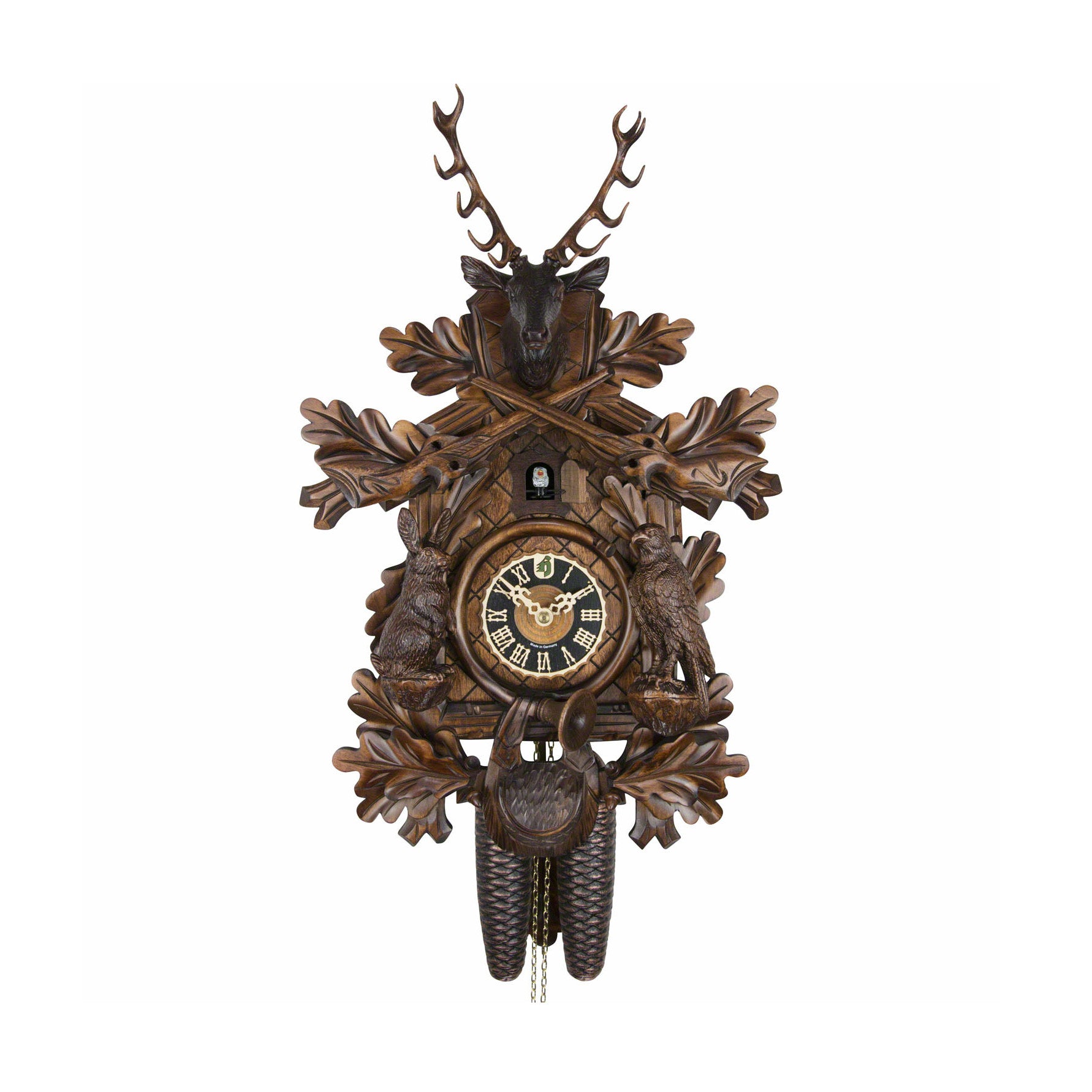 Carved 8-day hunting style cuckoo clock with large stag, rifles, fürst ...