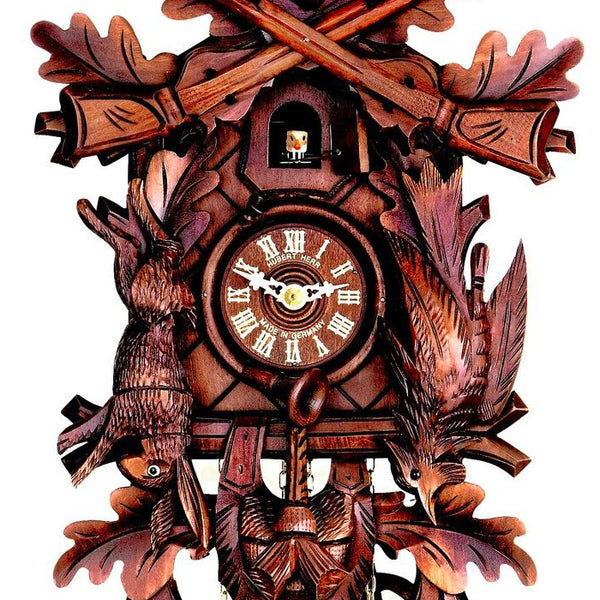 Carved 8-day Hunting-style cuckoo clock with rifles, hanging rabbit, p ...