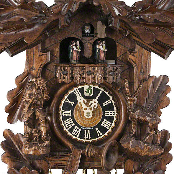 Carved 8-day hunting style musical cuckoo clock with large stag, ibex ...